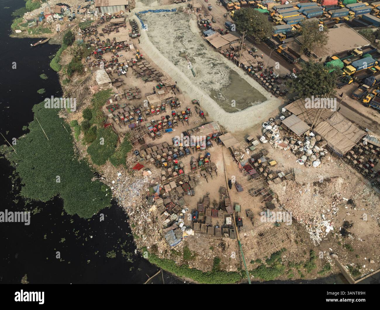 Aerial view of Bagan Bari recycling centre surrounded by urban ...