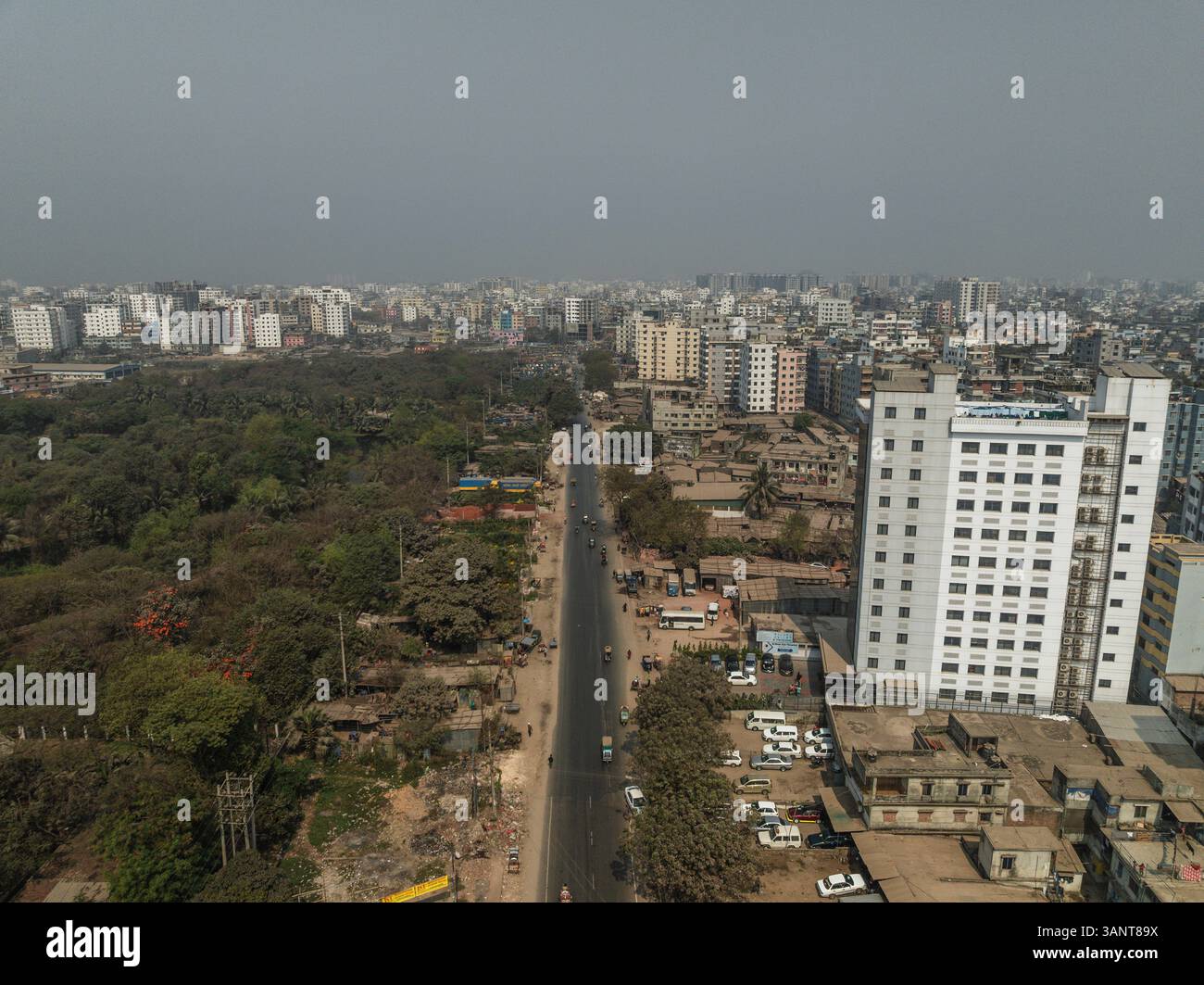 Aerial view of dense urban landscape with high-rise buildings and busy ...