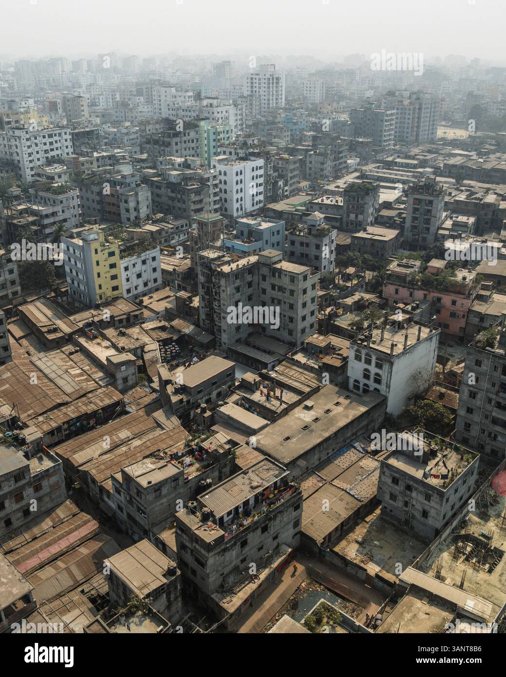 Aerial view of dense urban skyline with high-rise buildings and busy ...