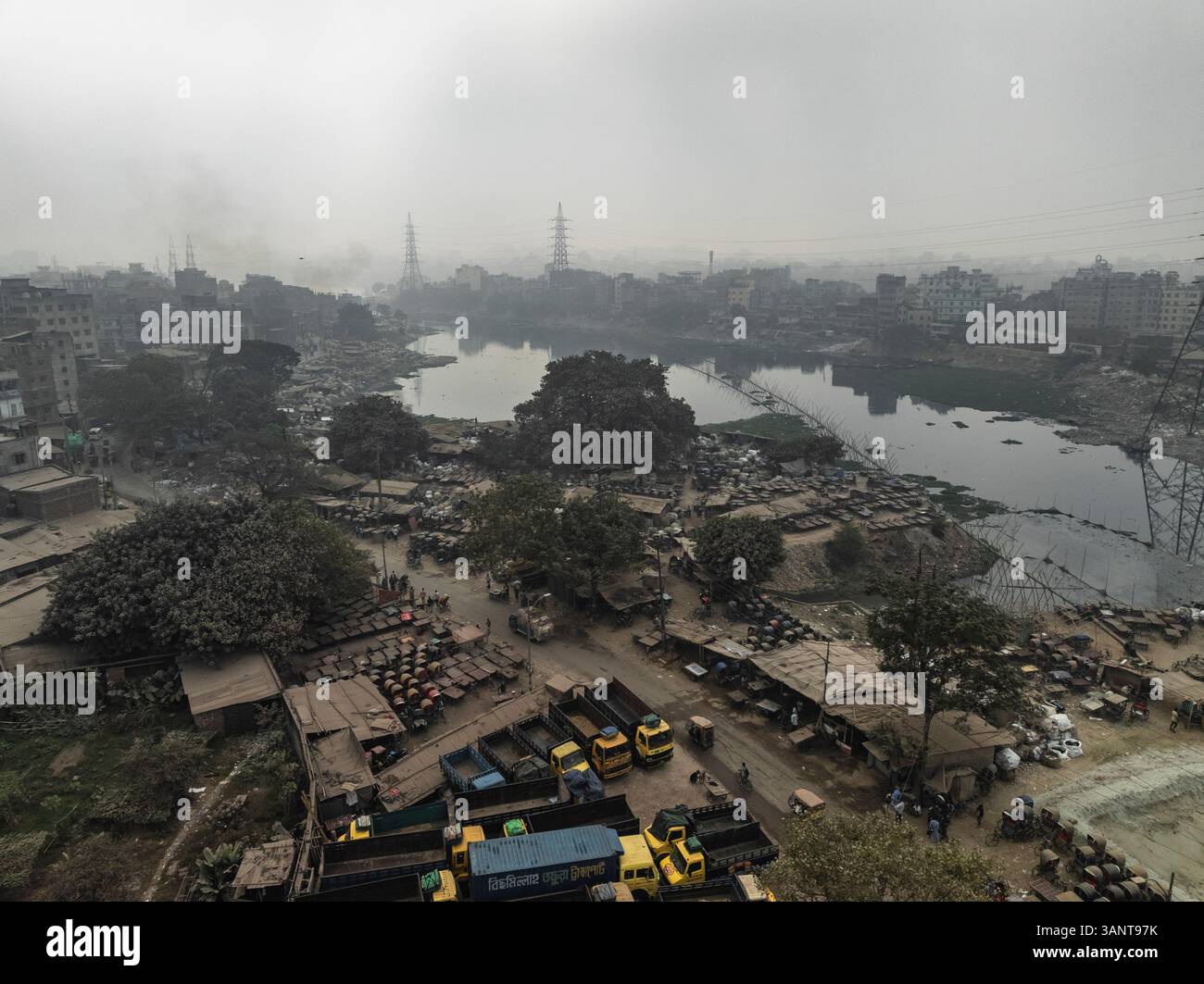 Aerial view of busy urban landscape with modern buildings and a river ...