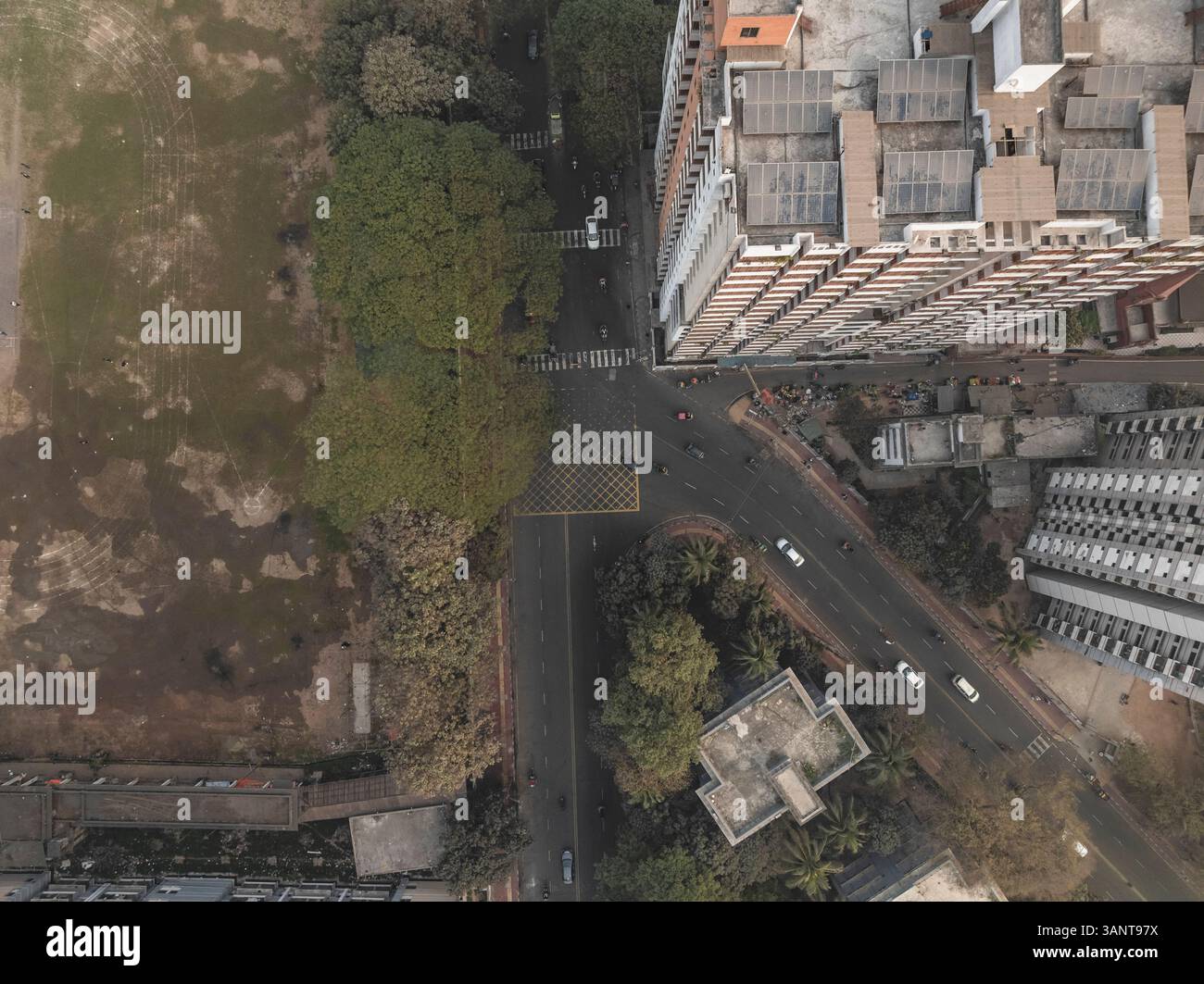 Aerial view of busy urban cityscape with high-rise buildings, roads ...