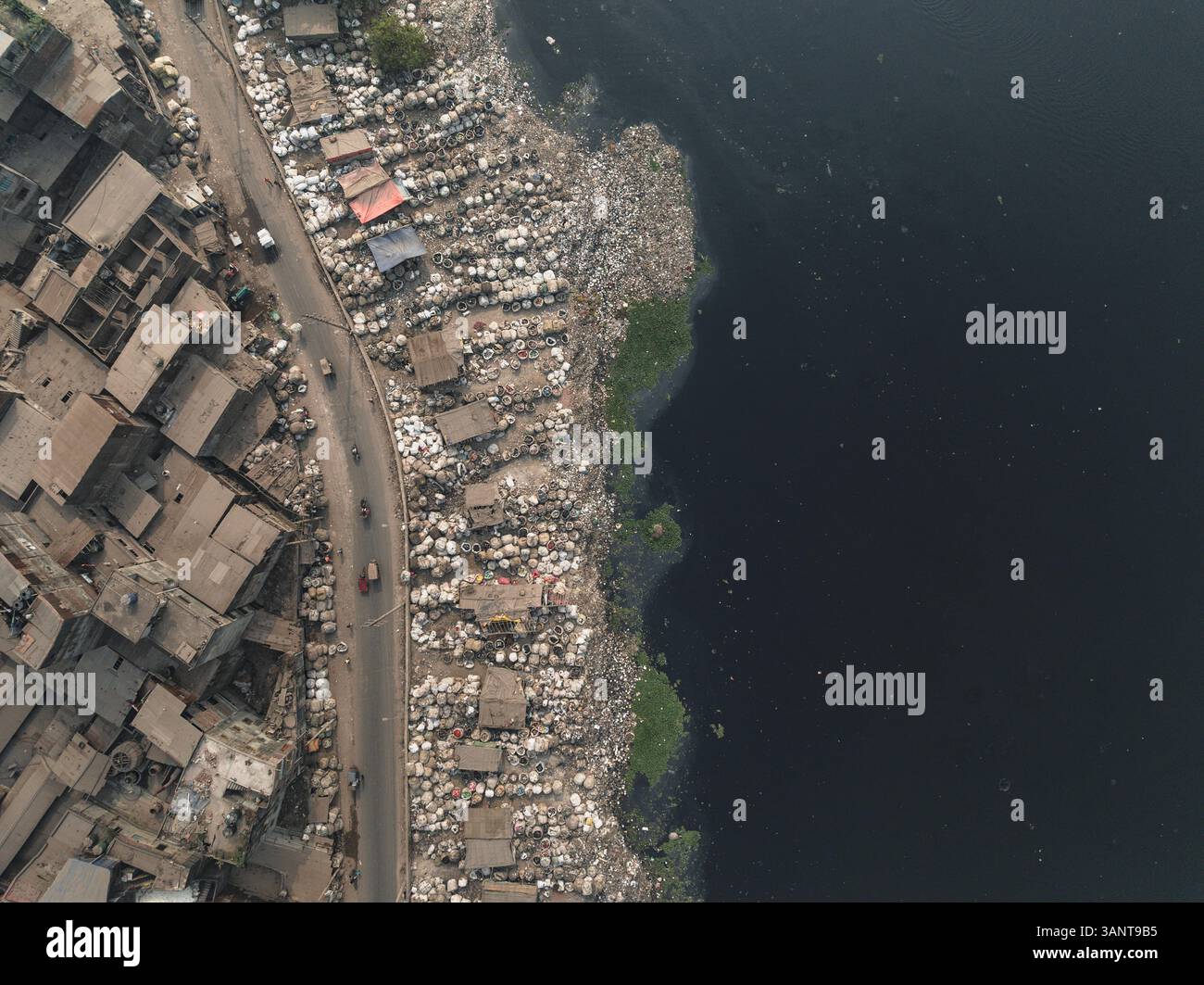 Aerial view of Bagan Bari recycling centre amidst urban landscape with ...