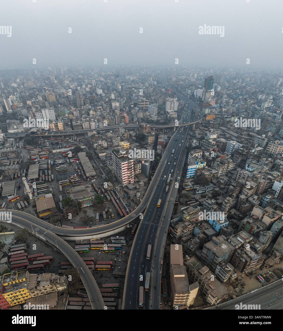 Aerial view of bustling cityscape with dense buildings and busy roads ...