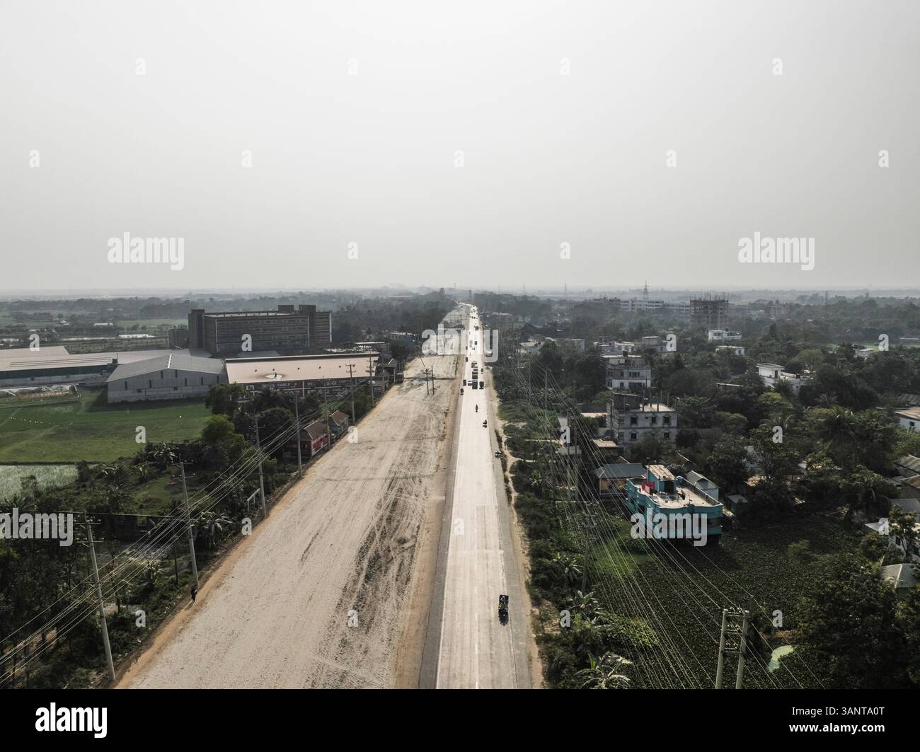 Aerial view of urban landscape featuring roads, highways, buildings ...