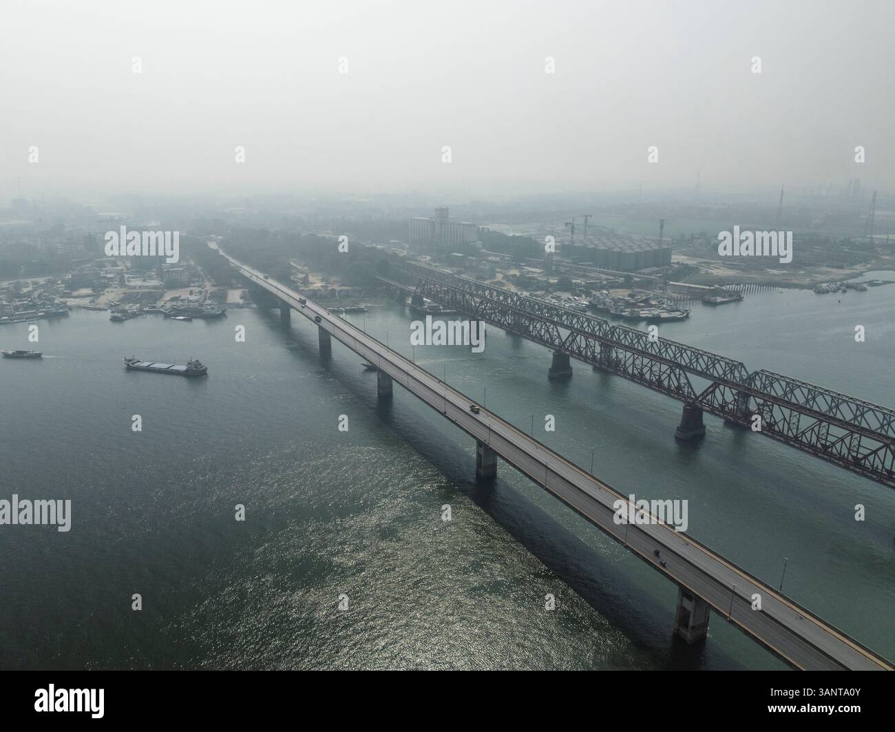 Aerial view of the breathtaking Meghna River with a modern bridge ...