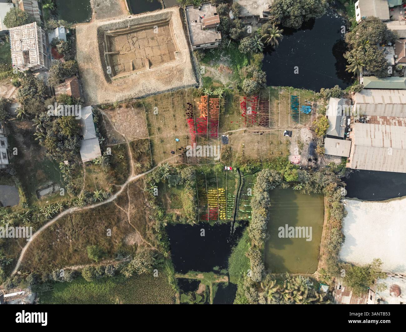 Aerial view of vibrant rural landscape with fields, ponds, and trees ...