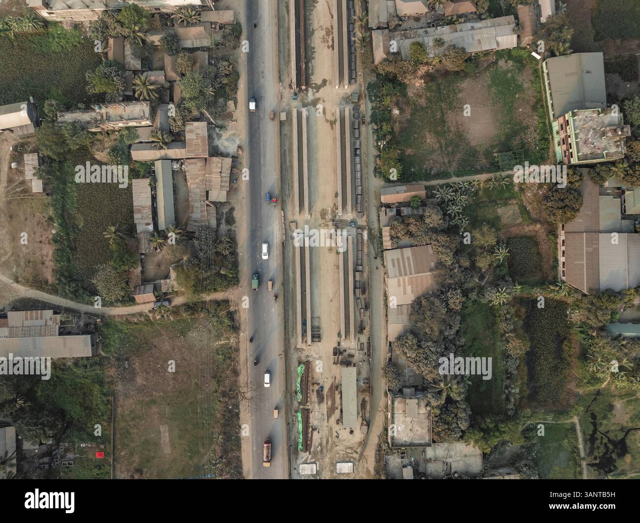 Aerial view of urban development with construction sites, roads, and ...