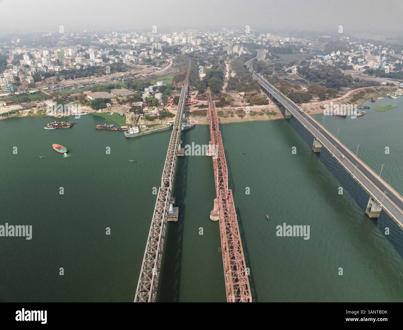 Aerial view of the scenic Meghna River with modern bridges and urban buildings, Bhairab, Dhaka ...