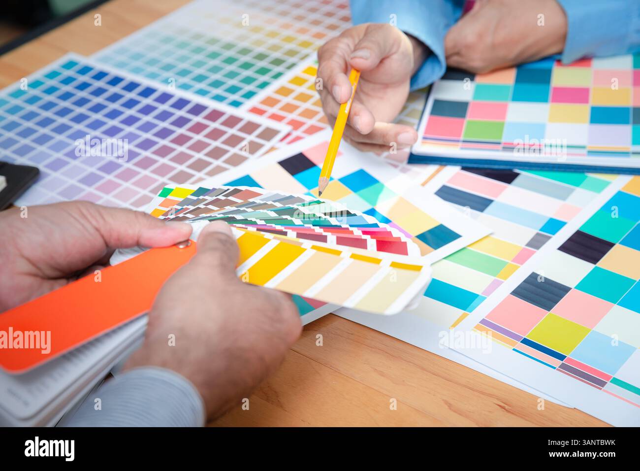 Interior designer chooses a color chart for home design. Graphic ...
