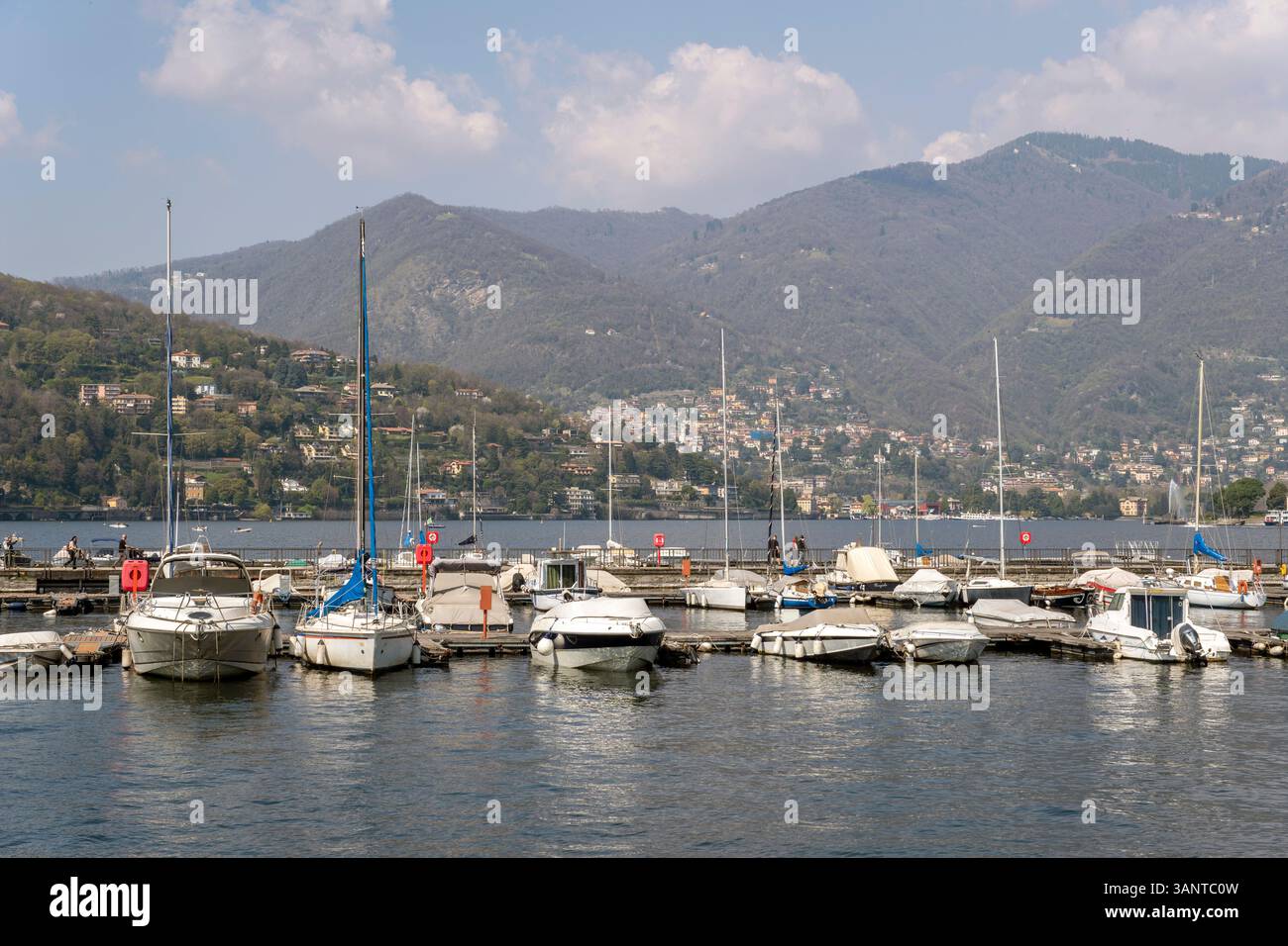 Como, Italy - April 4, 2025: View of Como from the port of Como on a ...