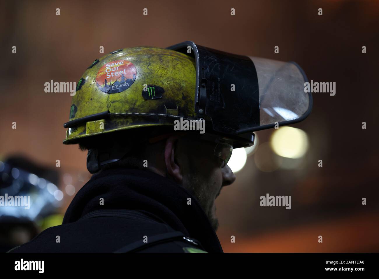 A Save our Steel sticker is pictured on the helmet of a worker at one ...
