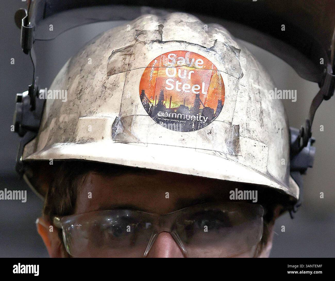 A Save our Steel sticker on the helmet of a worker at the British Steel ...