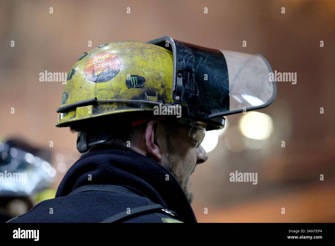 A Save our Steel sticker on the helmet of a worker at the British Steel ...