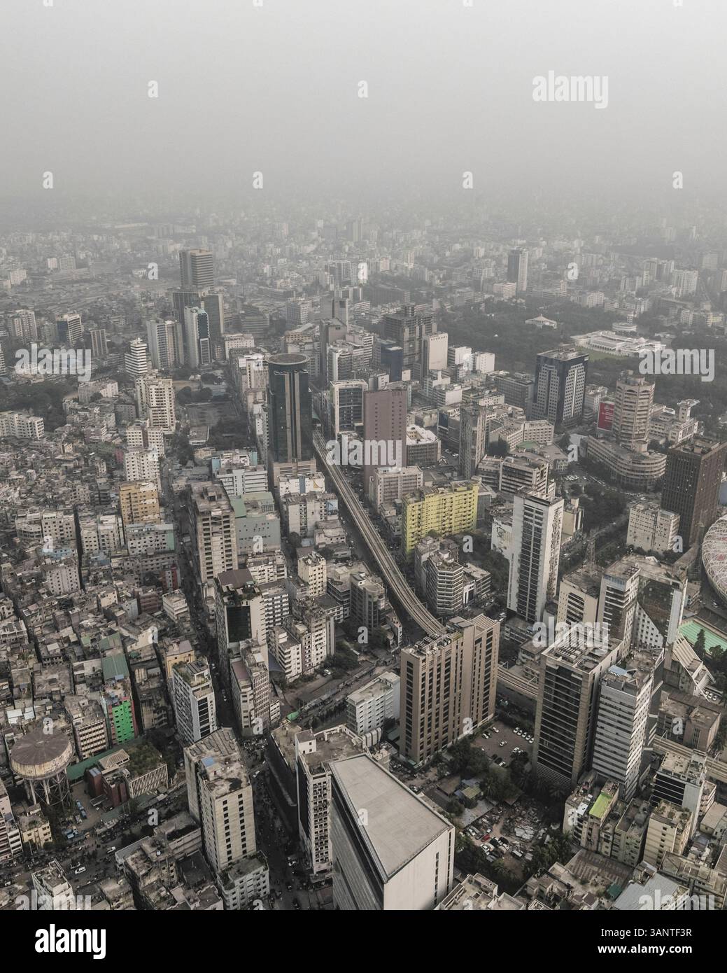 Aerial view of bustling cityscape with high-rise buildings and busy ...