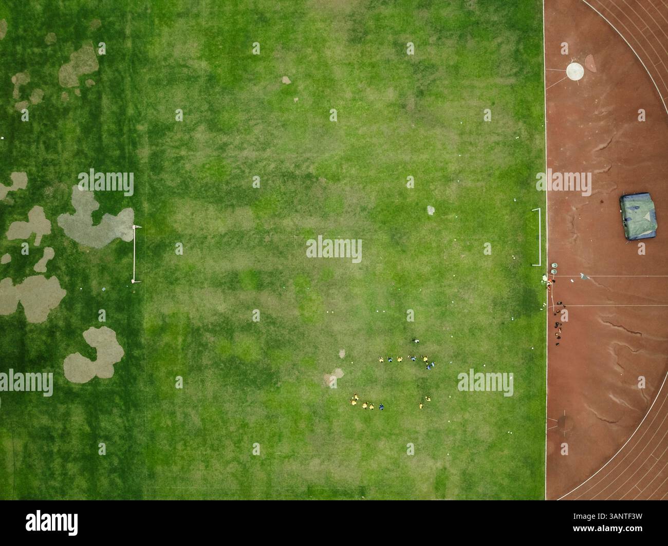 Aerial view of Bangladesh National Stadium with green grass soccer ...