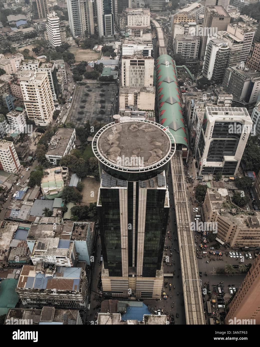 Aerial view of modern cityscape with skyscrapers and busy roads ...
