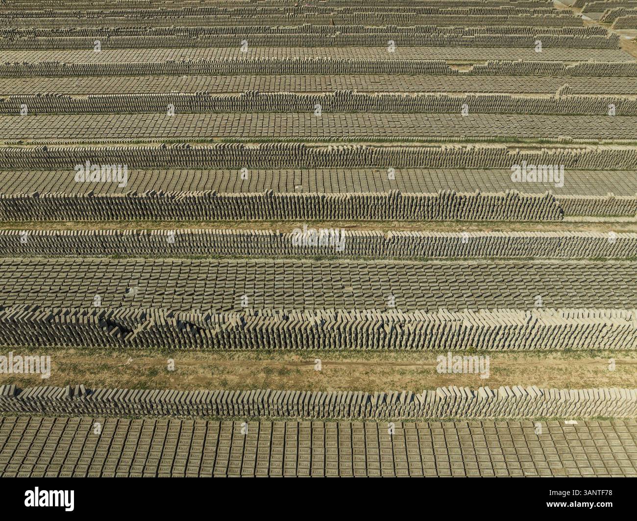 Aerial view of brick fields with organized rows and patterns, Suti Para ...