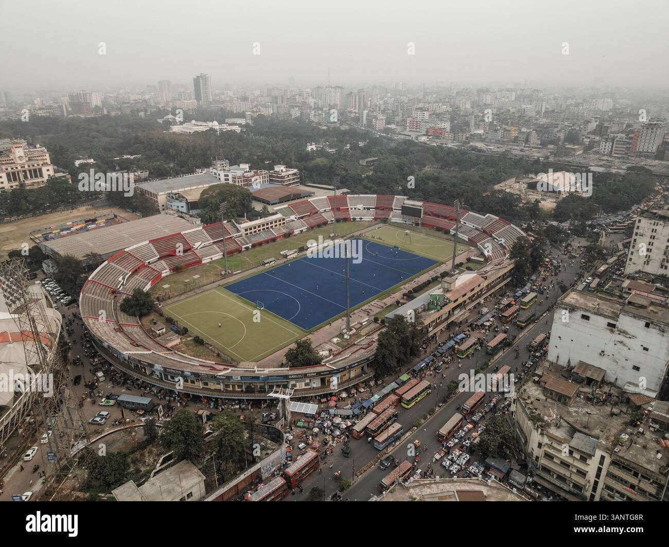 Aerial view of bangladesh national stadium surrounded by urban ...
