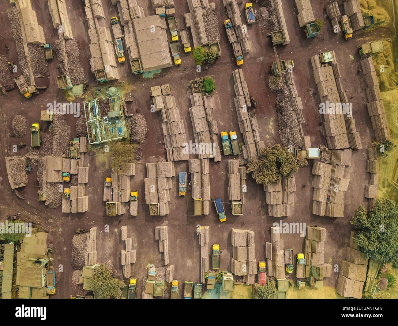 Aerial view of industrial cement industries and dense urban landscape ...