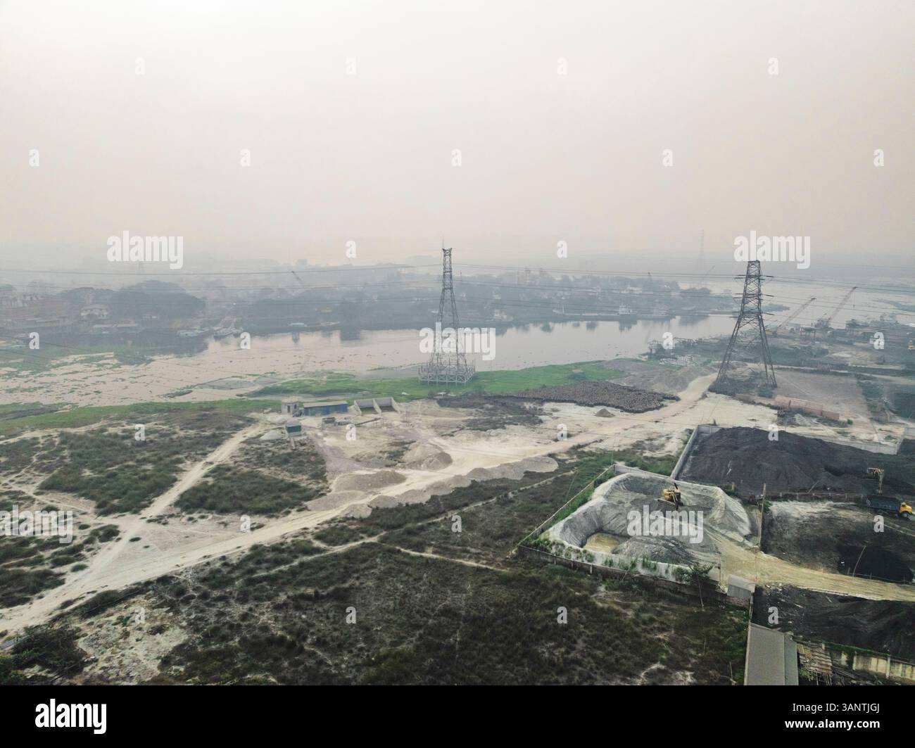 Aerial view of industrial landscape featuring a coal factory and power ...