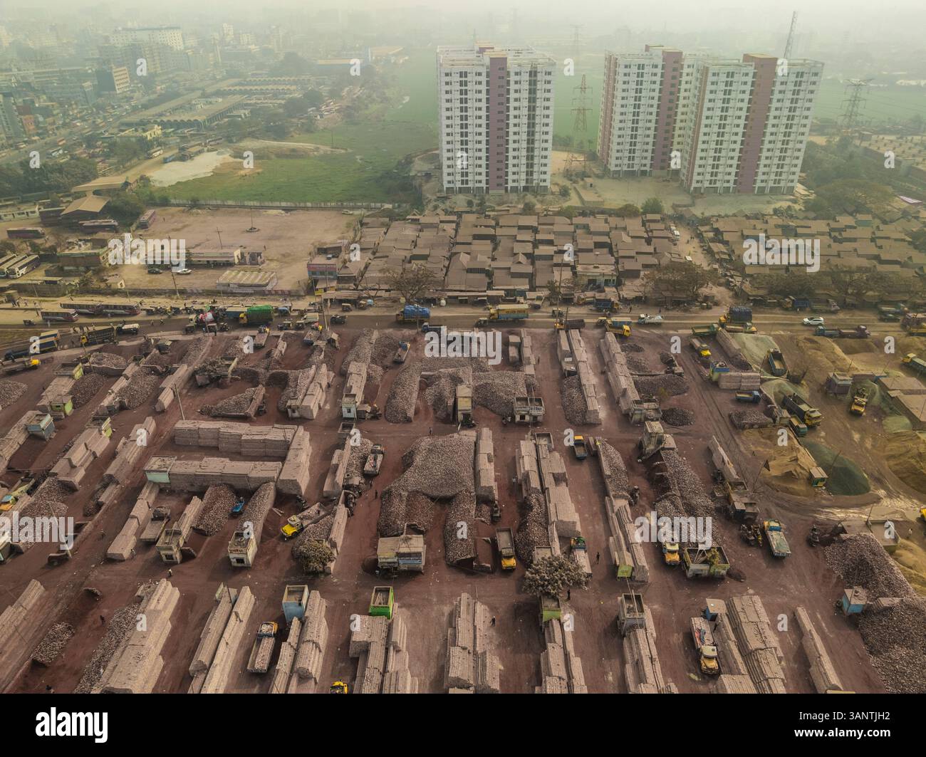 Aerial view of industrial area with cement industries, trucks, and high ...