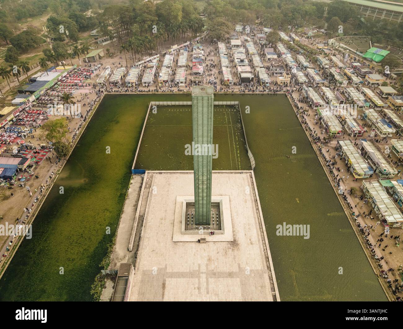 Aerial view of the Museum of Independence surrounded by bustling crowds ...