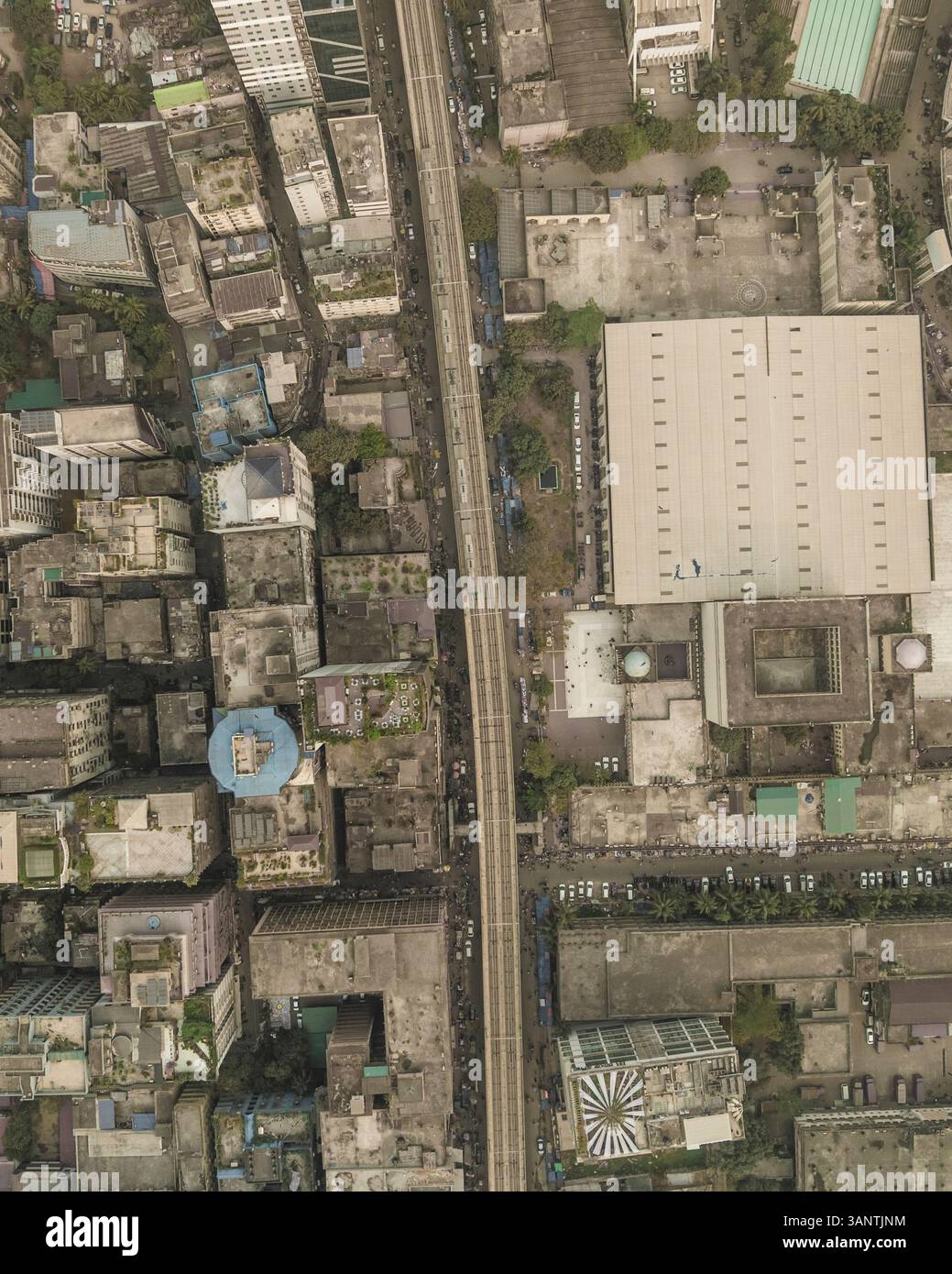 Aerial view of vibrant cityscape with high-rise buildings and busy ...