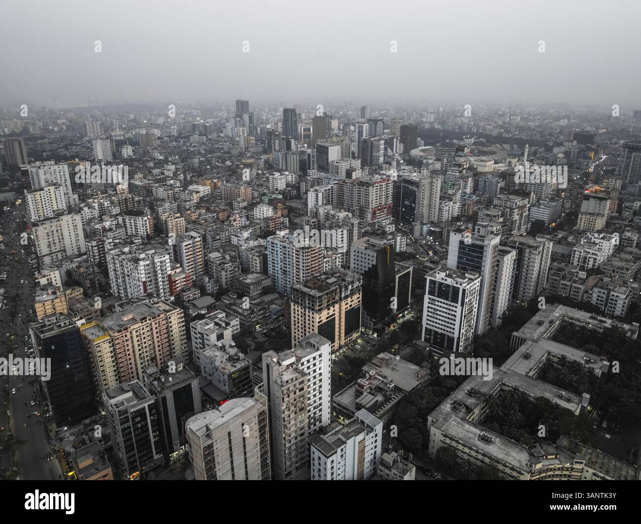 Aerial view of bustling urban skyline with modern skyscrapers and dense ...