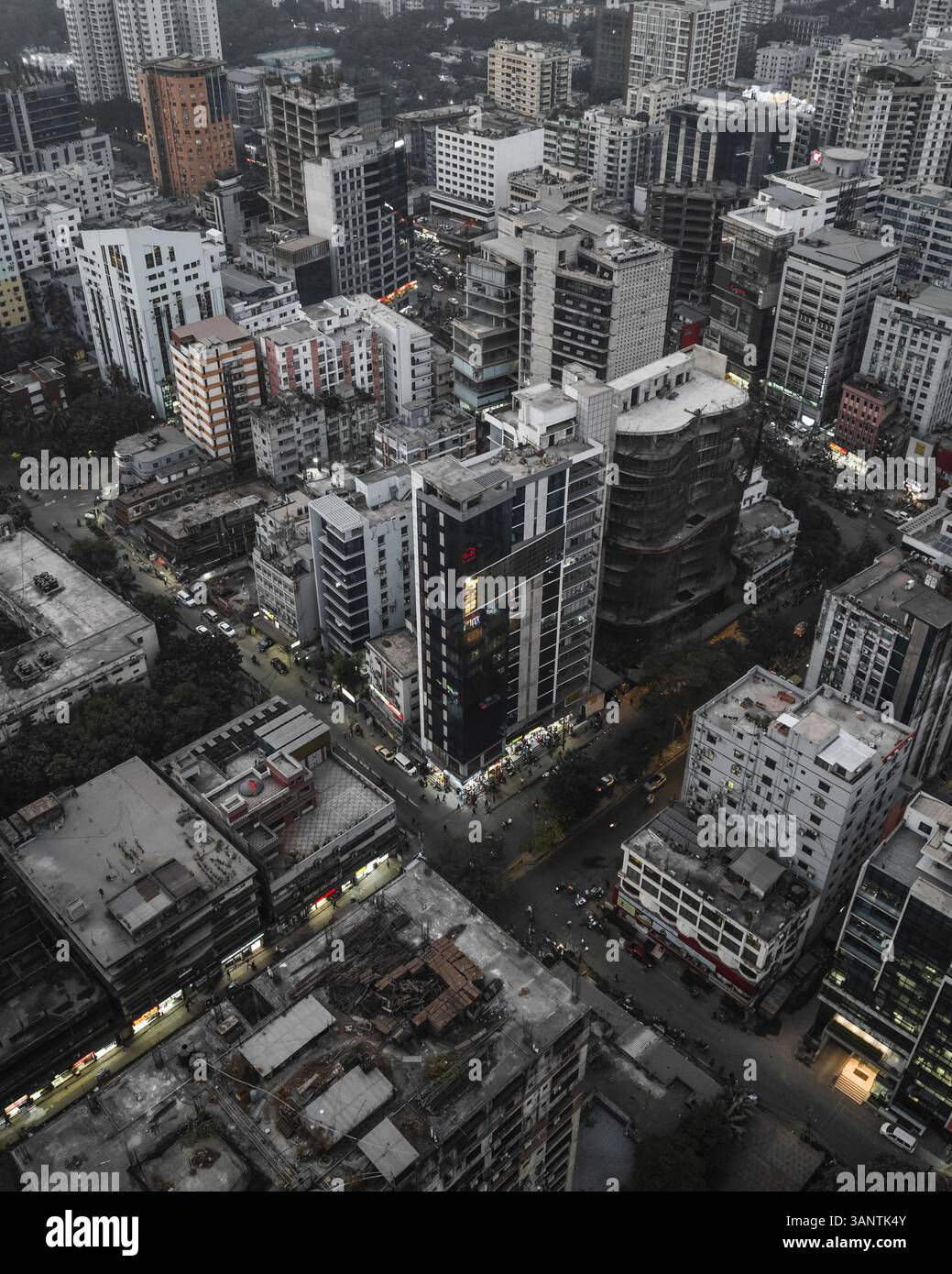 Aerial view of bustling cityscape with high-rise buildings and crowded ...