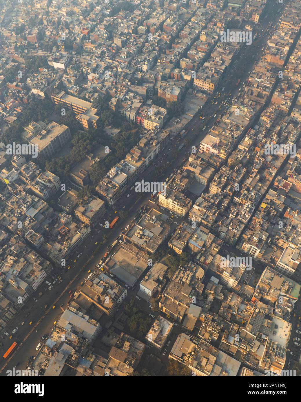 Aerial view of bustling cityscape with crowded residential buildings ...