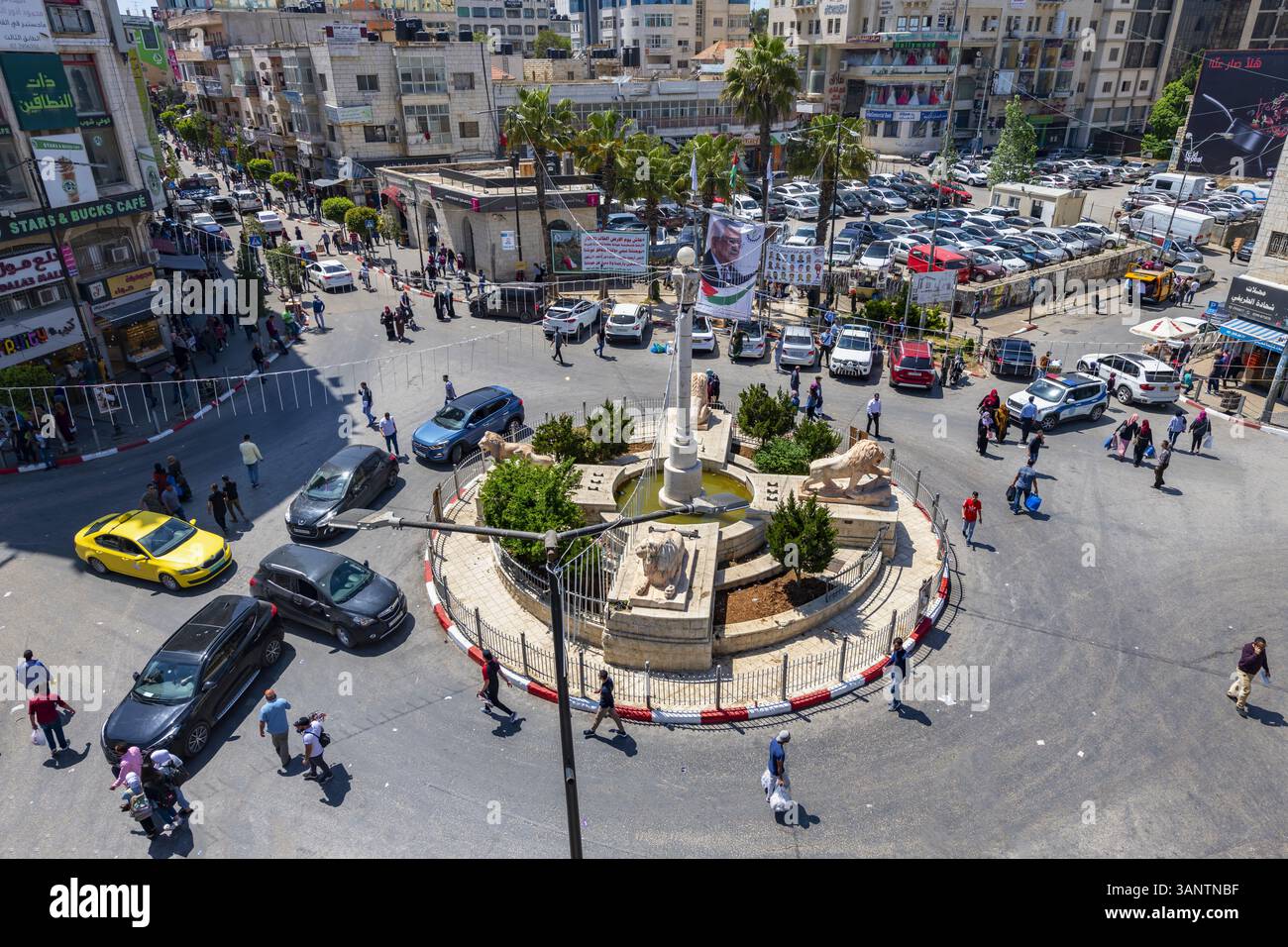 People walk through Al-Manara Square in Ramallah, Palestine Stock Photo ...