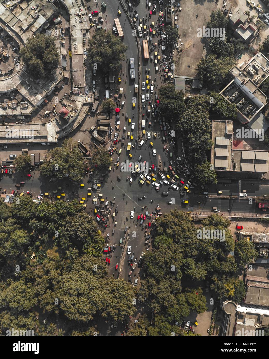 Aerial view of a bustling traffic intersection with crowded vehicles ...