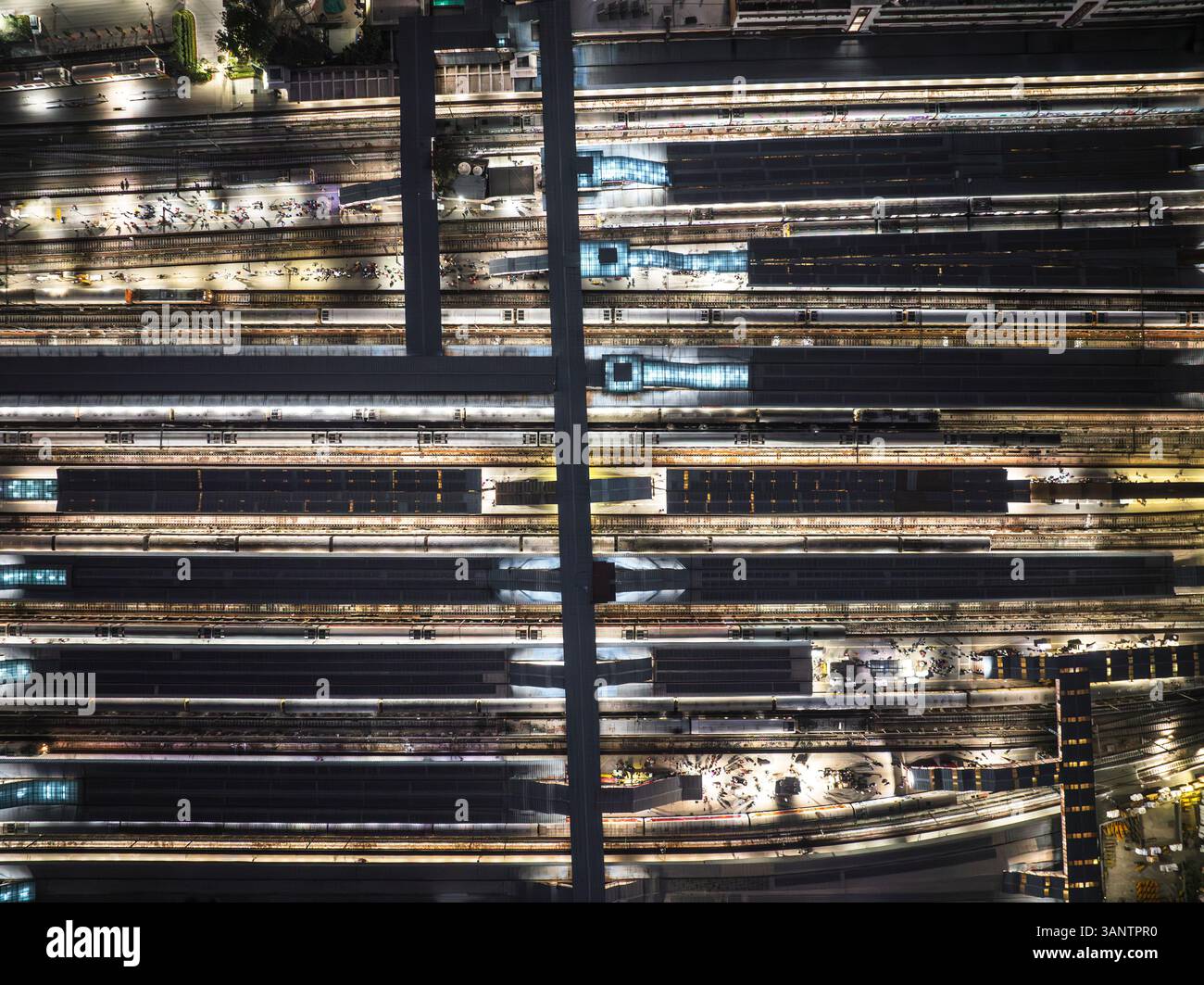 Aerial view of bustling Ajmeri Gate train station with vibrant lights ...