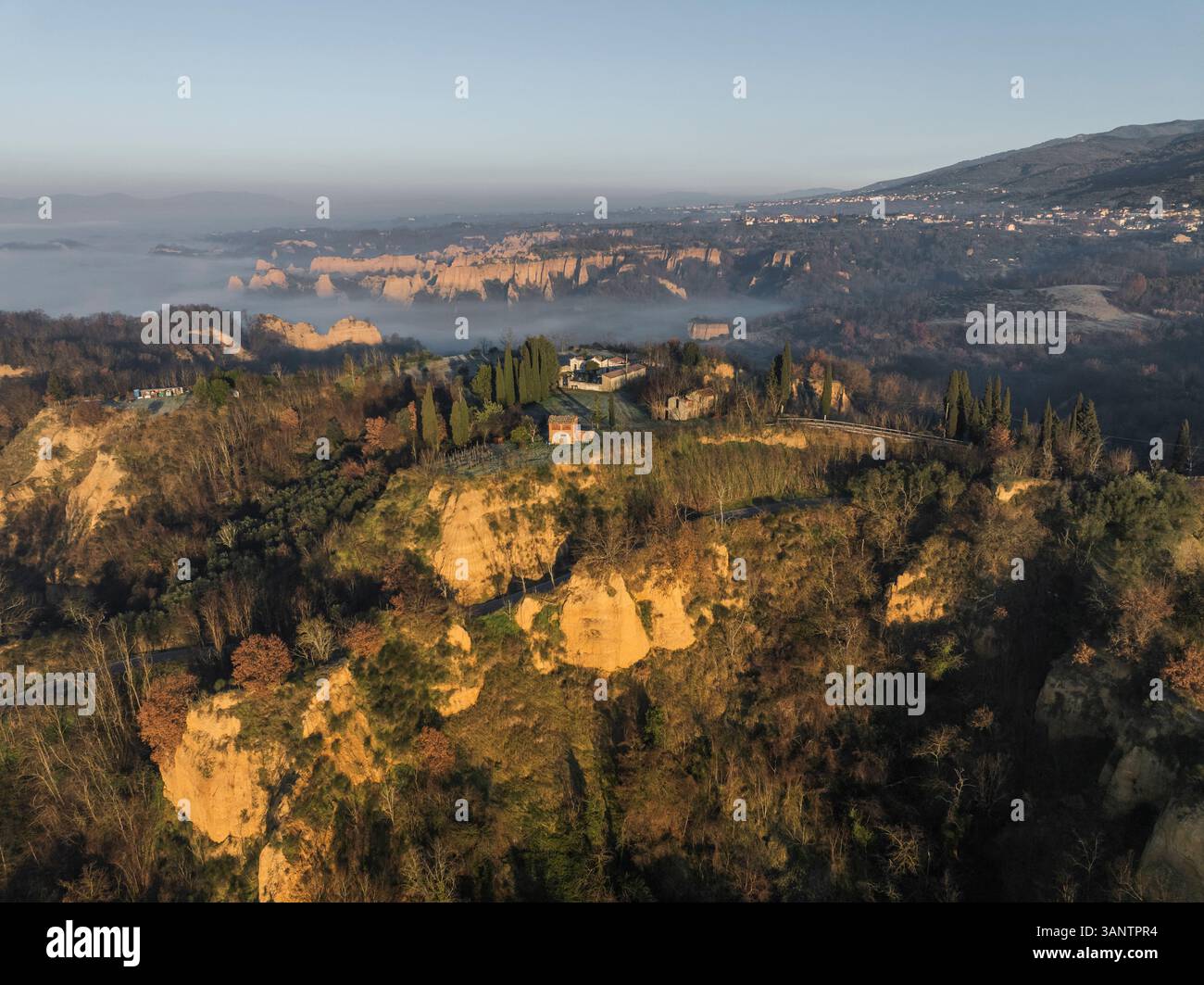 Aerial view of balze valdarno with fog and mist at sunrise, Tuscany ...