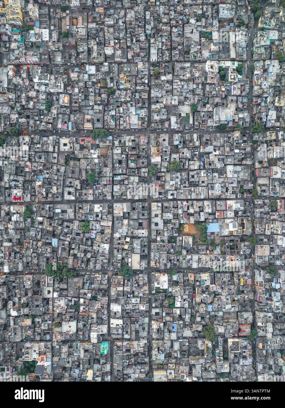 Aerial view of vibrant and colorful cityscape with dense rooftops and ...