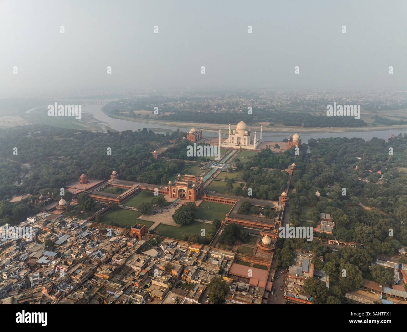 Aerial view of the iconic Taj Mahal surrounded by beautiful gardens and ...