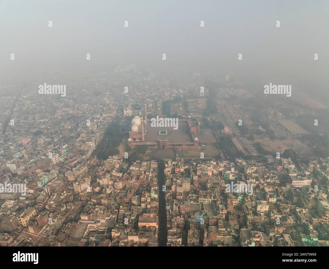 Aerial view of bustling Chandni Chowk with historic Jama Masjid and vibrant urban sprawl, New ...