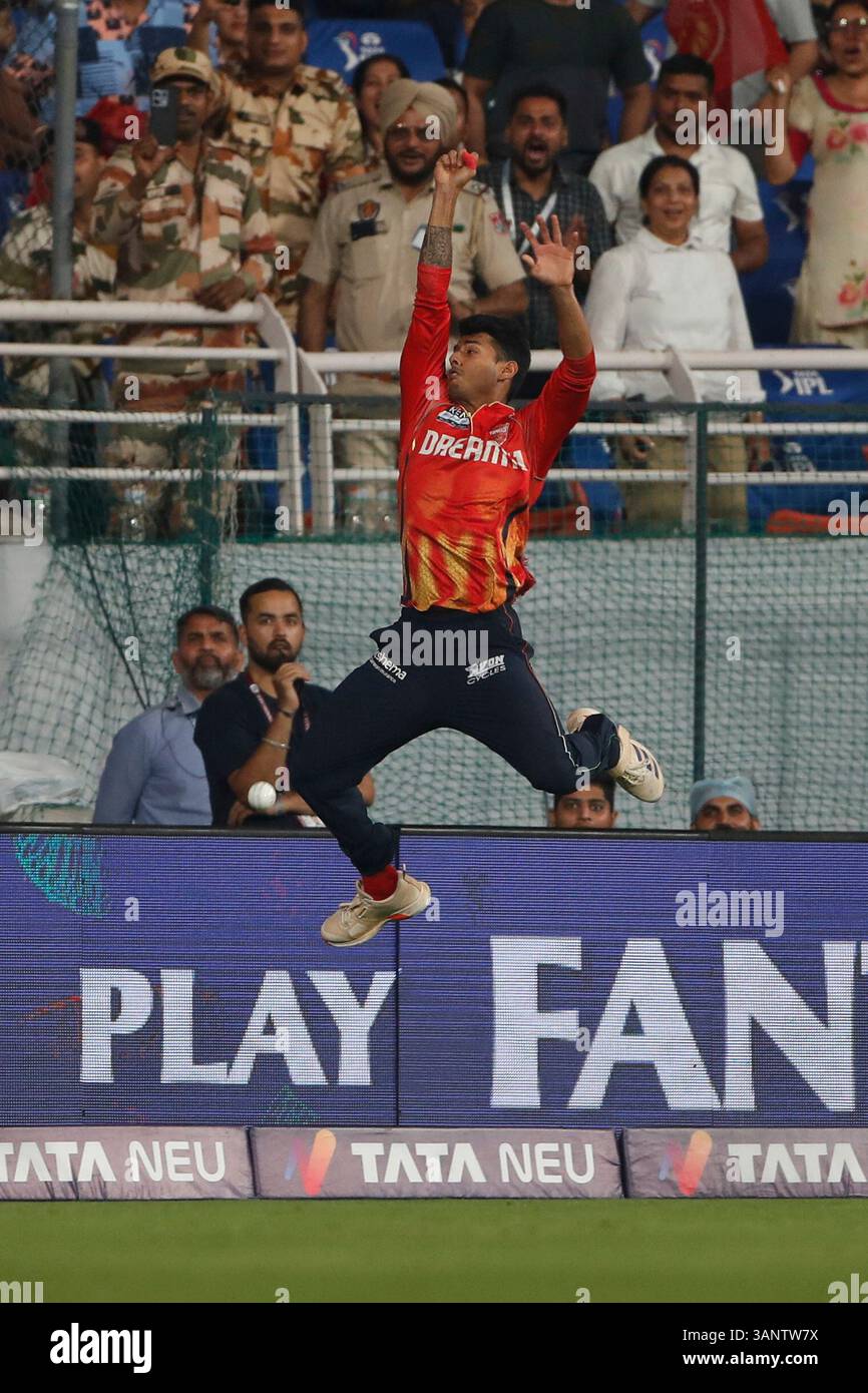 Punjab Kings' Suryansh Shedge leaps in an attempt to save a boundary ...