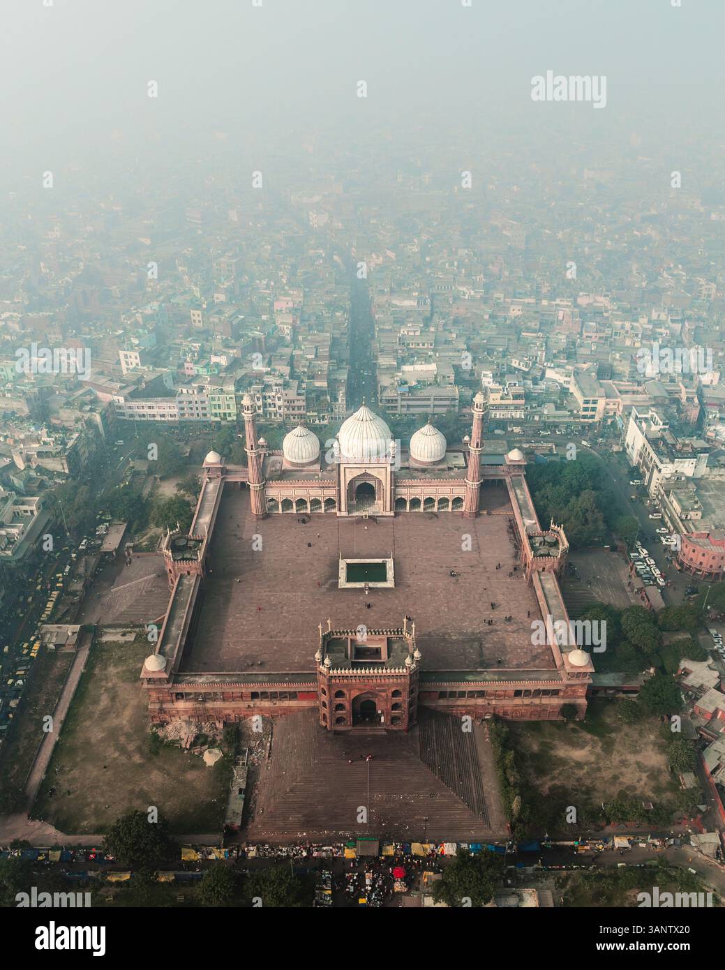 Aerial view of the majestic Jama Masjid mosque surrounded by the ...