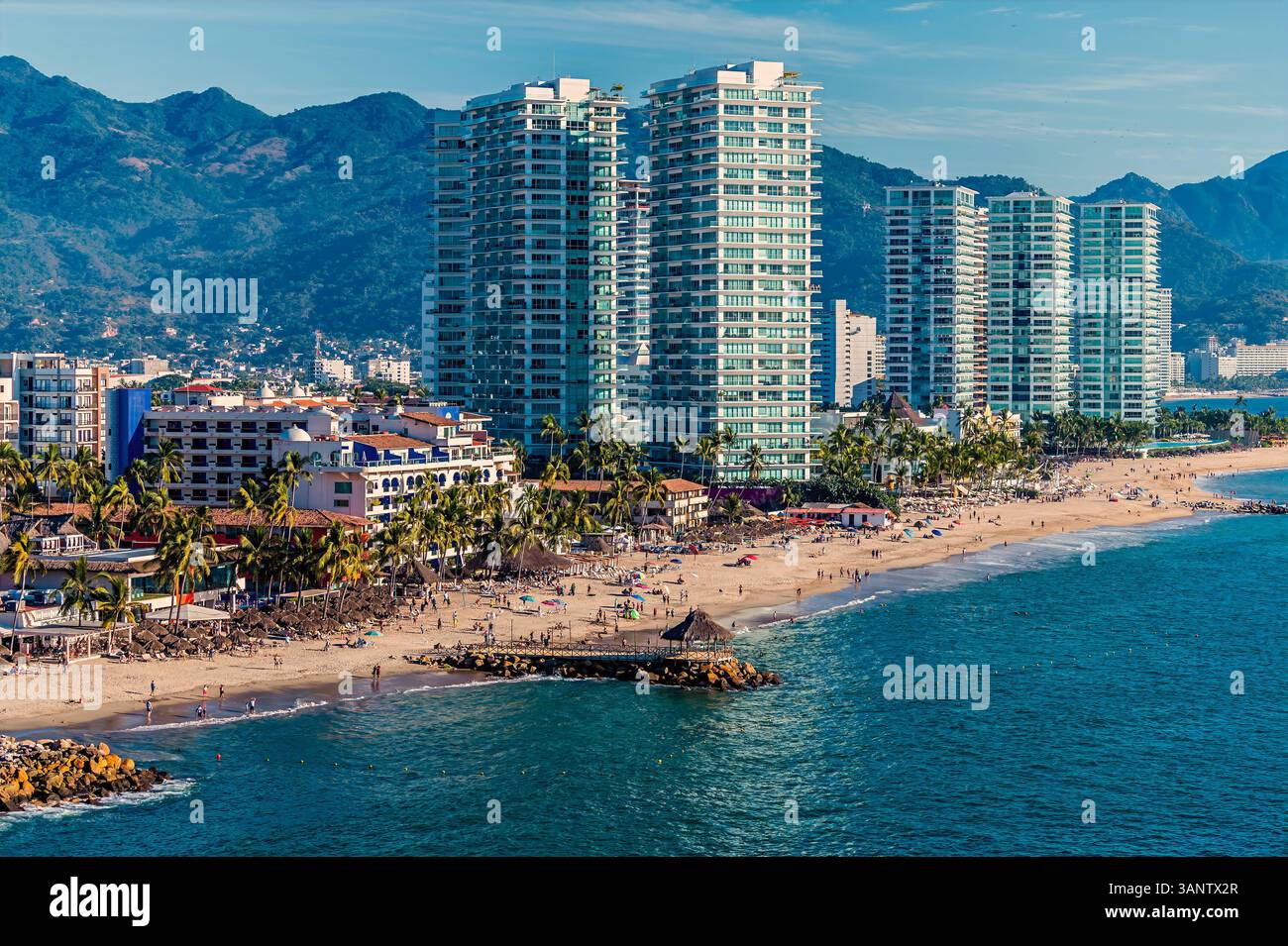 An aerial view along beaches beside resort hotels in Puerto Vallarta in ...