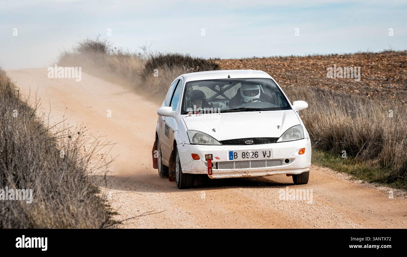 Madrid, Spain; 02-15-2025: A Ford Focus 1.6 rally car blazes past on a ...