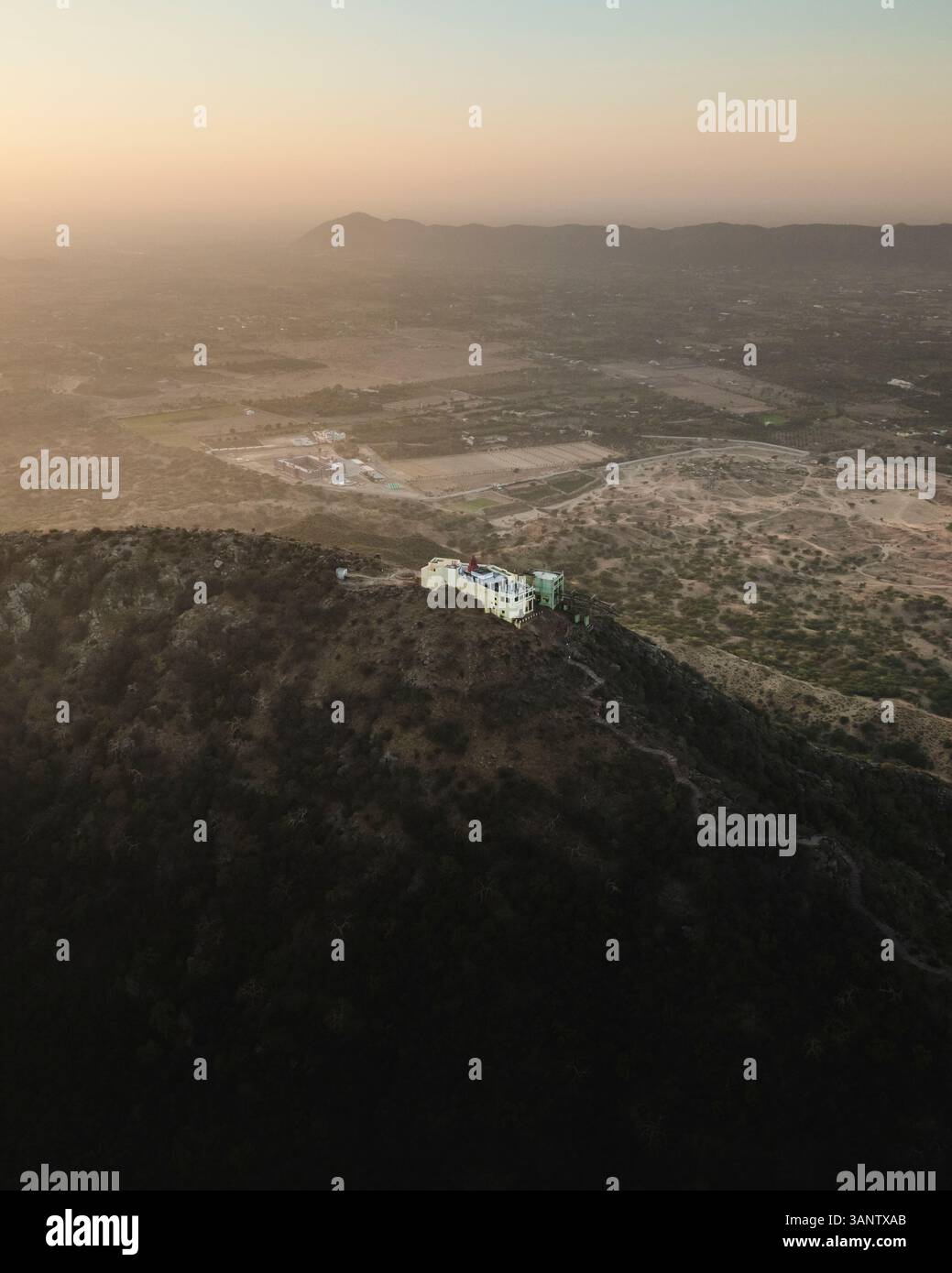 Aerial view of Shree Savitri Mata Temple on a serene mountain during ...