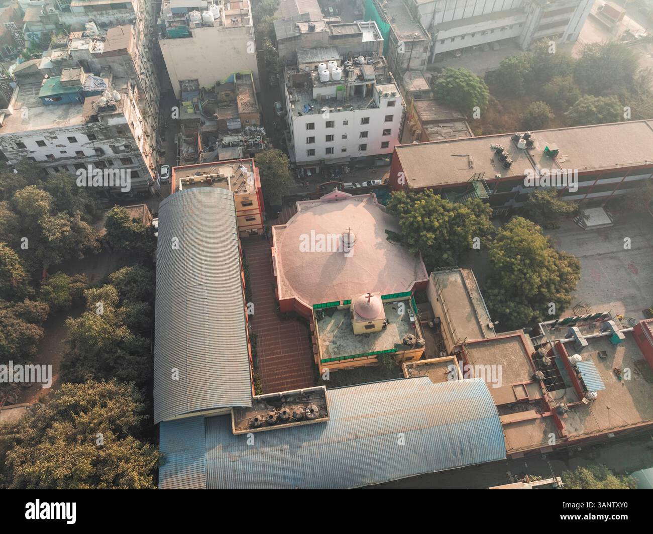 Aerial view of bustling Pahar Ganj with vibrant buildings and greenery ...