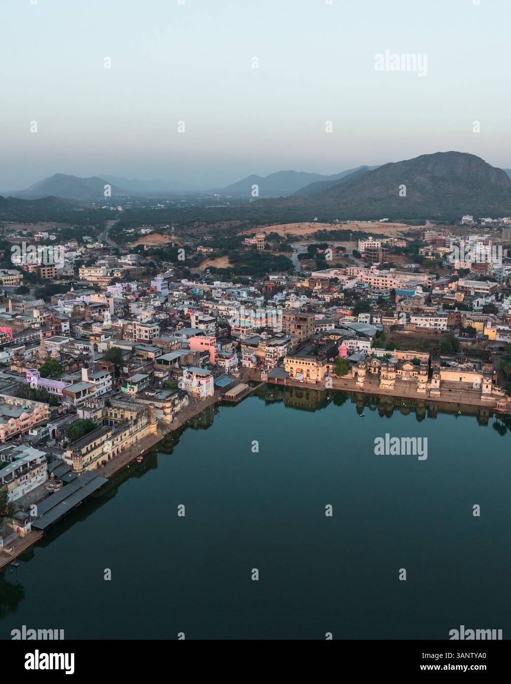 Aerial view of Pushkar Lake with colorful ghats and vibrant buildings ...