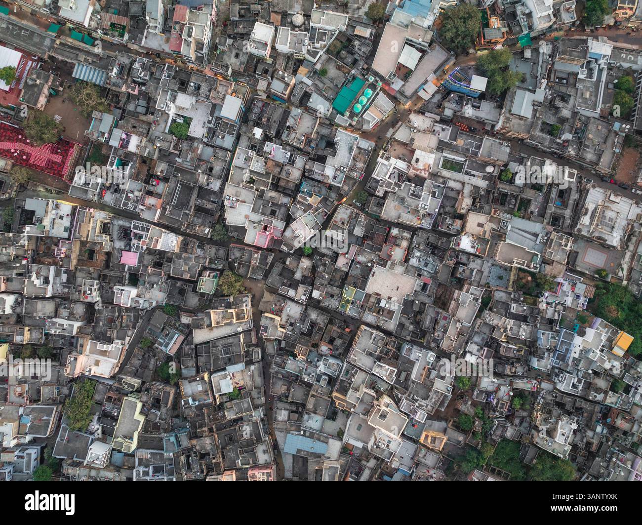 Aerial view of densely populated urban landscape with rooftops and ...