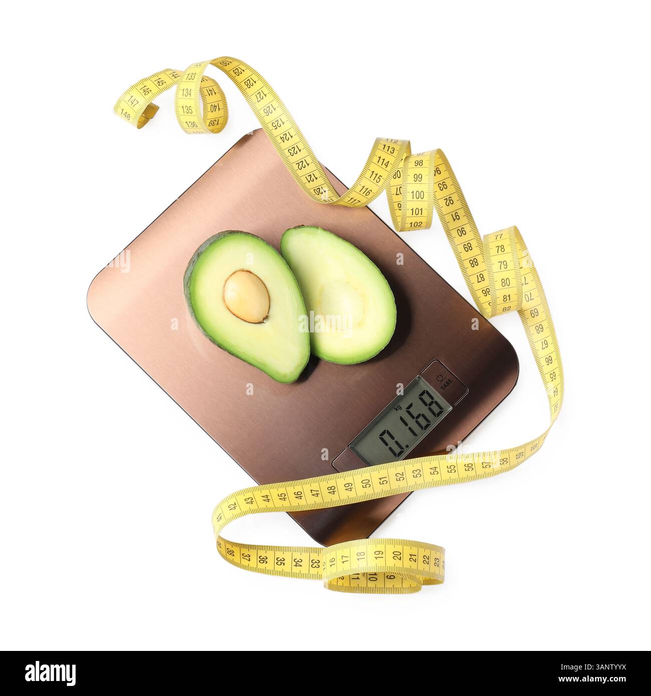 Electronic kitchen scales, avocado and measuring tape isolated on white ...