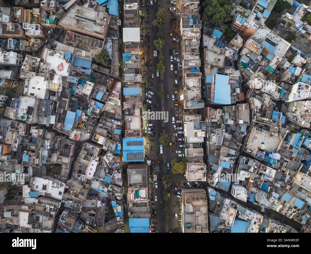 Aerial view of vibrant and bustling rooftops and streets in a densely ...