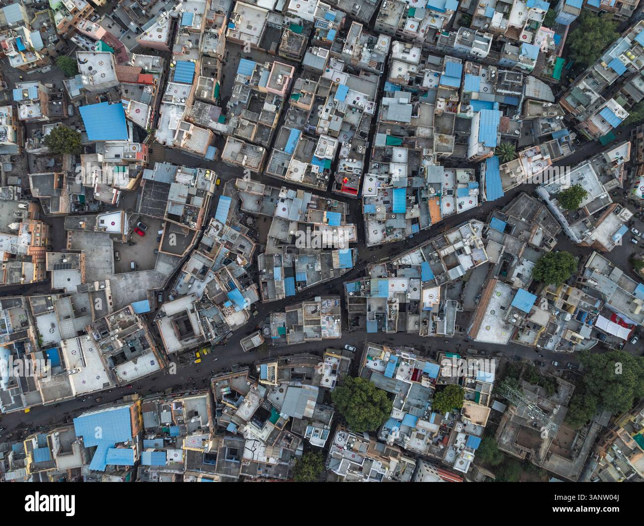 Aerial view of vibrant and colorful rooftops and streets in a dense ...