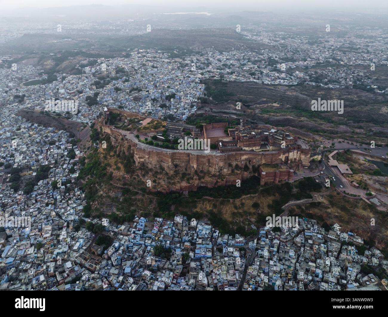 Aerial view of mehrangarh fort overlooking the vibrant blue city and ...