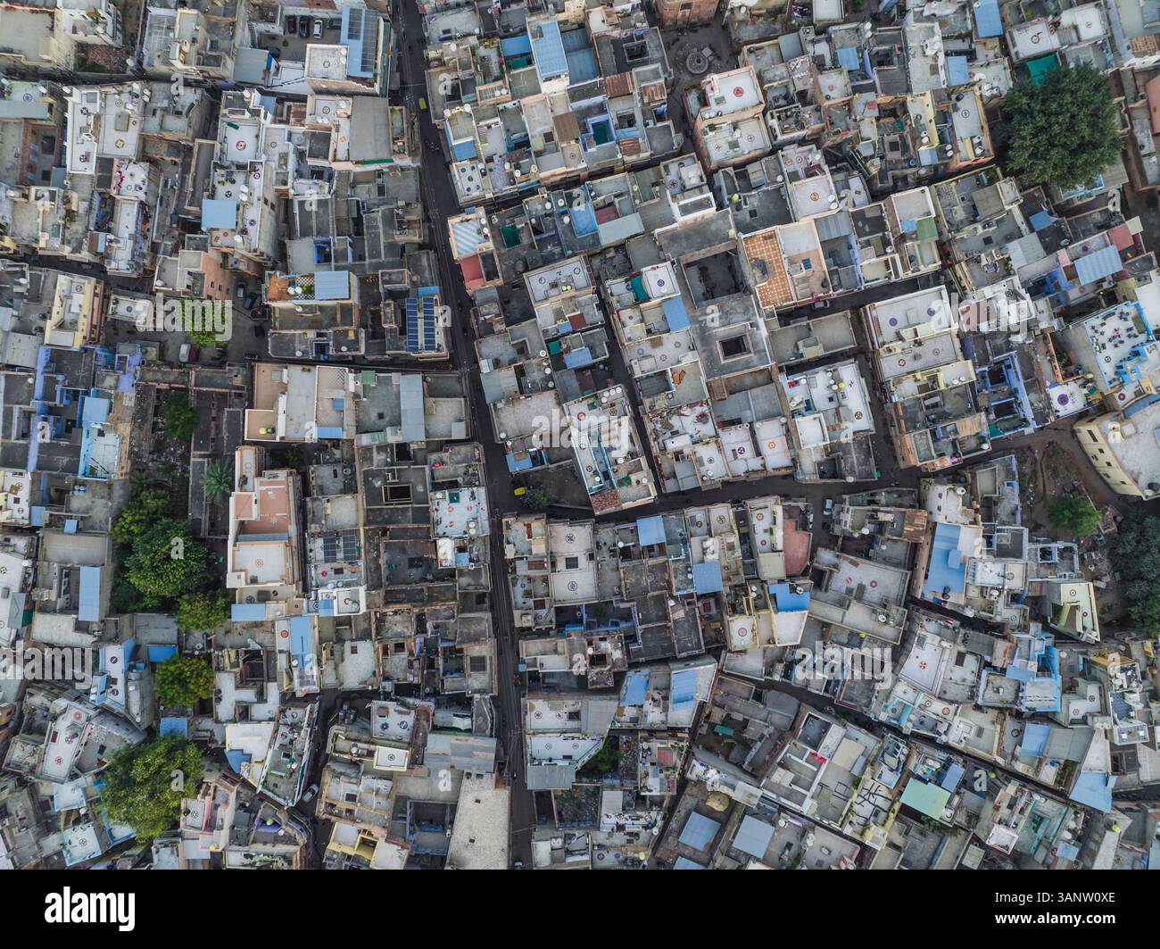 Aerial view of colorful densely packed rooftops and buildings in a ...